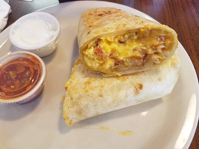 Breakfast burritos: where morning essentials meet their destiny wrapped in a warm tortilla hug with salsa on standby.