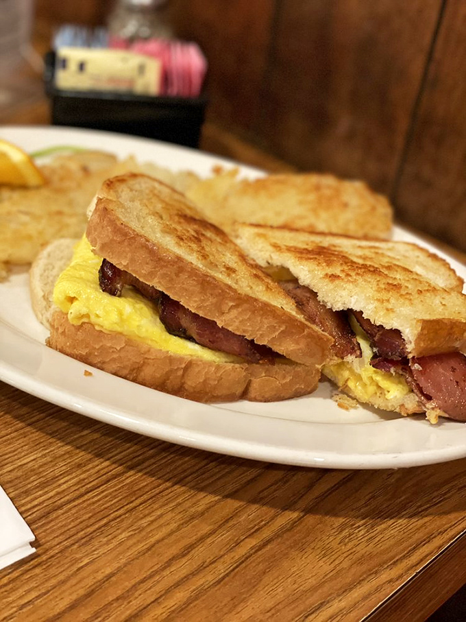 Breakfast doesn't get more comforting than this golden grilled sandwich. The marriage of eggs, bacon, and cheese proves some relationships are simply meant to be.