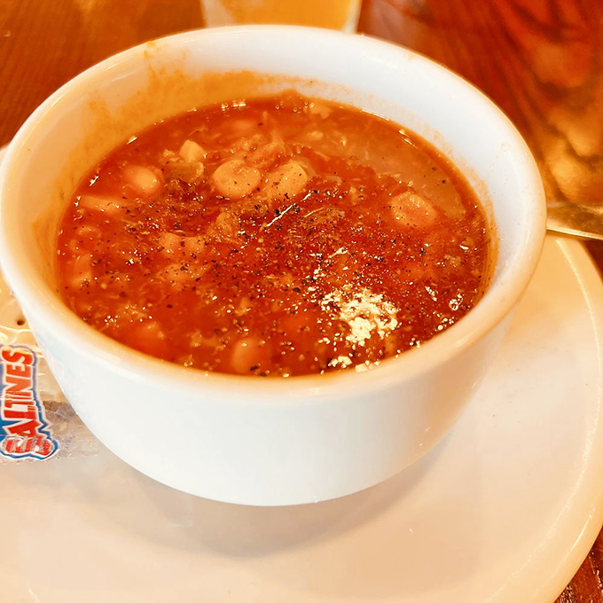 This isn't just chili—it's a hearty, bean-studded potion that would make even the most dedicated soup skeptic reach for a spoon.