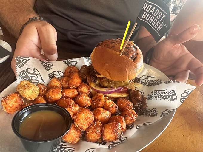 This burger comes with a side of sweet potato tots that look like little amber jewels. The perfect marriage of savory and sweet&mdash;like finding the ideal radio station on a road trip.