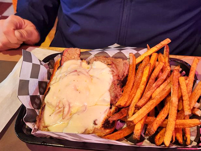 Brisket so tender it practically surrenders at the sight of your fork, paired with sweet potato fries that deserve their own fan club.