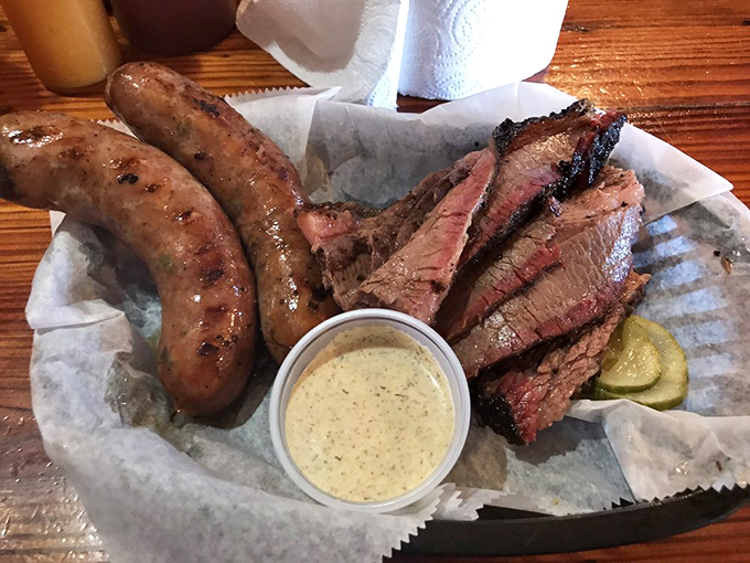 When you can't decide between smoked meats, why choose? This brisket and sausage plate is diplomacy on a tray.