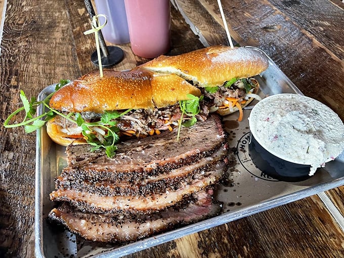 The jerk rib tips arrive looking like they've been kissed by smoke gods, with scallions adding a fresh counterpoint to that magnificent char.