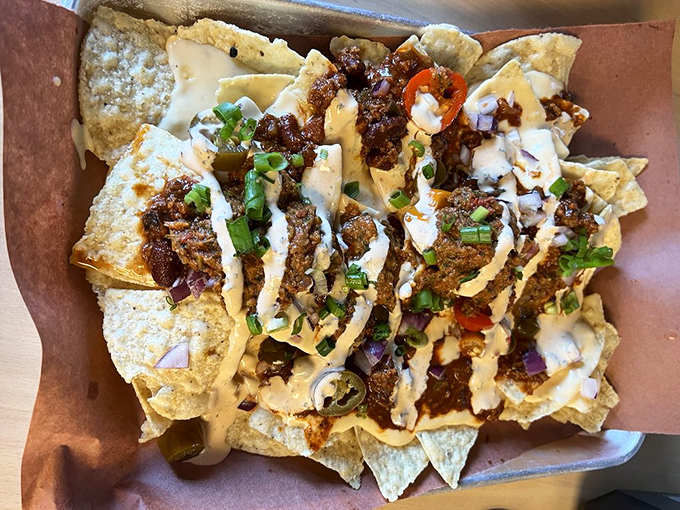 These loaded nachos aren't just a starter&mdash;they're a declaration of intent. When brisket meets chips, cheese, and jalape&ntilde;os, resistance becomes futile.