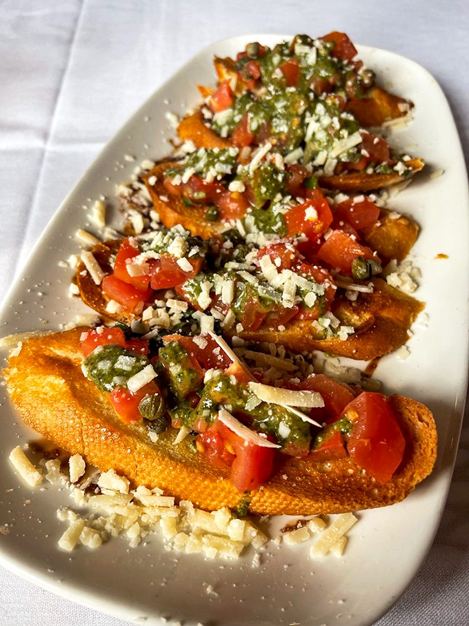 These bruschetta look like they've been sunbathing in Italy&mdash;crisp toast supporting a mound of tomatoes, basil, and cheese that screams summer.