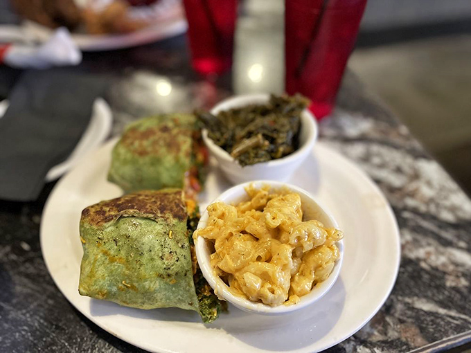 Green vegetables strategically positioned next to mac and cheese&mdash;nature's way of saying "balance." The wrap is just holding the party together.