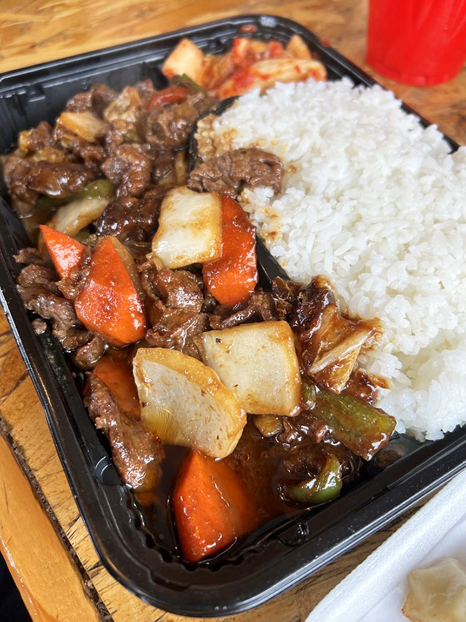 Beyond burgers, Big Sky's bulgogi rice bowl shows their culinary range, offering tender beef, fresh vegetables, and steamed rice that would make your Korean grandmother nod in approval.