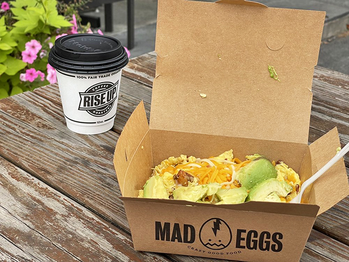 Avocado, eggs, and cheese unite in a cardboard vessel of morning delight&mdash;proof that sometimes the best breakfasts don't require utensils.