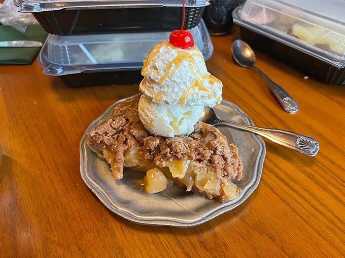 Apple pie reimagined with a buttery crumb topping and ice cream crown&mdash;proof that America's classic dessert can still surprise after all these years.