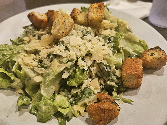 Caesar salad that Julius himself would approve &ndash; crisp romaine, generous Parmesan shavings, and croutons with the perfect crunch-to-yield ratio.