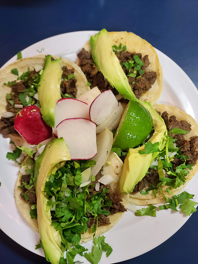 These street tacos come dressed for success with fresh cilantro, radish, and avocado&mdash;the holy trinity of taco perfection.