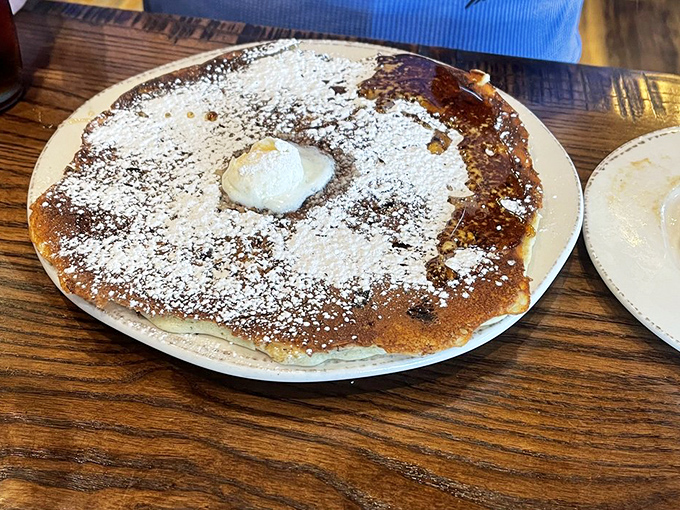 Not your ordinary pancake, this powdered sugar-dusted disc of delight comes with a dollop of what can only be described as cloud-like cream.