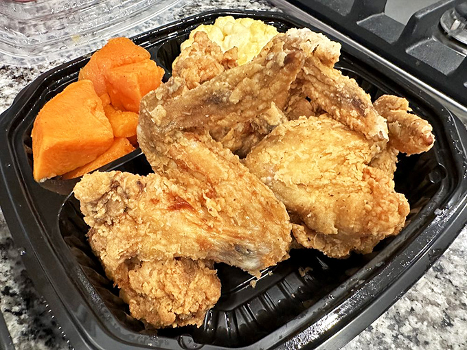 Even in takeout form, this chicken maintains its dignity and deliciousness. The to-go container might as well be labeled "Happiness Box."