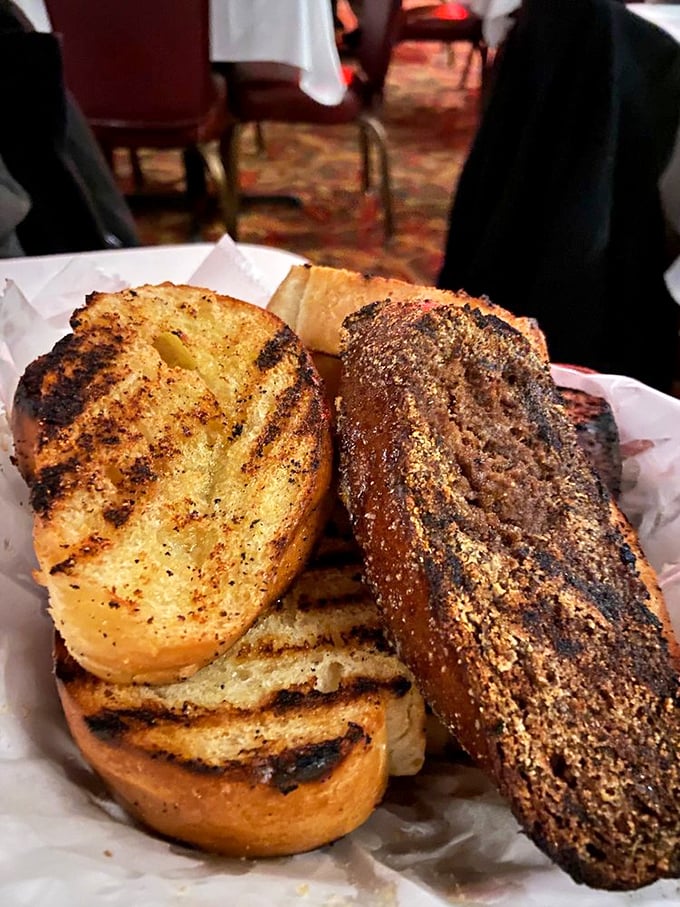 Garlic toast that could make a vampire reconsider its life choices. Worth every bit of tomorrow's breath mint emergency.