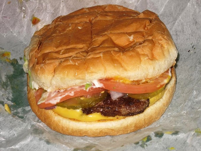 The classic Whatta-Burger in its natural habitat&mdash;simple, honest, and dressed with fresh veggies. Poetry between buns.