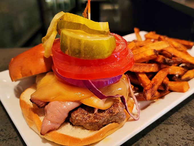 A burger that demands respect and a proper grip. Those hand-cut fries aren't just sides&mdash;they're supporting characters in this delicious drama.