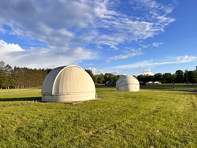 These curious dome structures aren't alien landing pods—they're observatories where the serious star-hunters track celestial game across Pennsylvania's darkest skies.