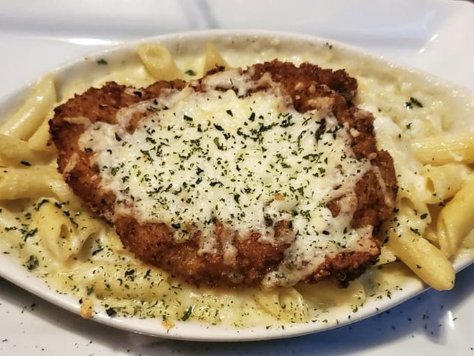 This chicken parmesan isn't just dinner&mdash;it's a warm hug on a plate, with golden-brown breading and melted cheese blanketing perfectly cooked pasta.