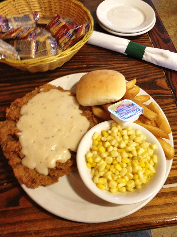 Chicken fried steak smothered in gravy—where comfort food goes to show off. Add corn and fries, and suddenly Monday doesn't seem so bad.