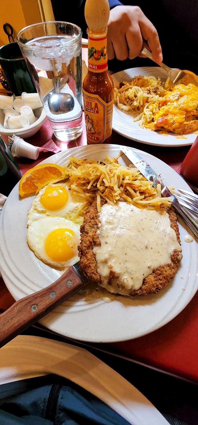 Country-fried steak that could make a vegetarian weep with temptation. Crispy exterior, tender interior, and gravy that deserves its own fan club.
