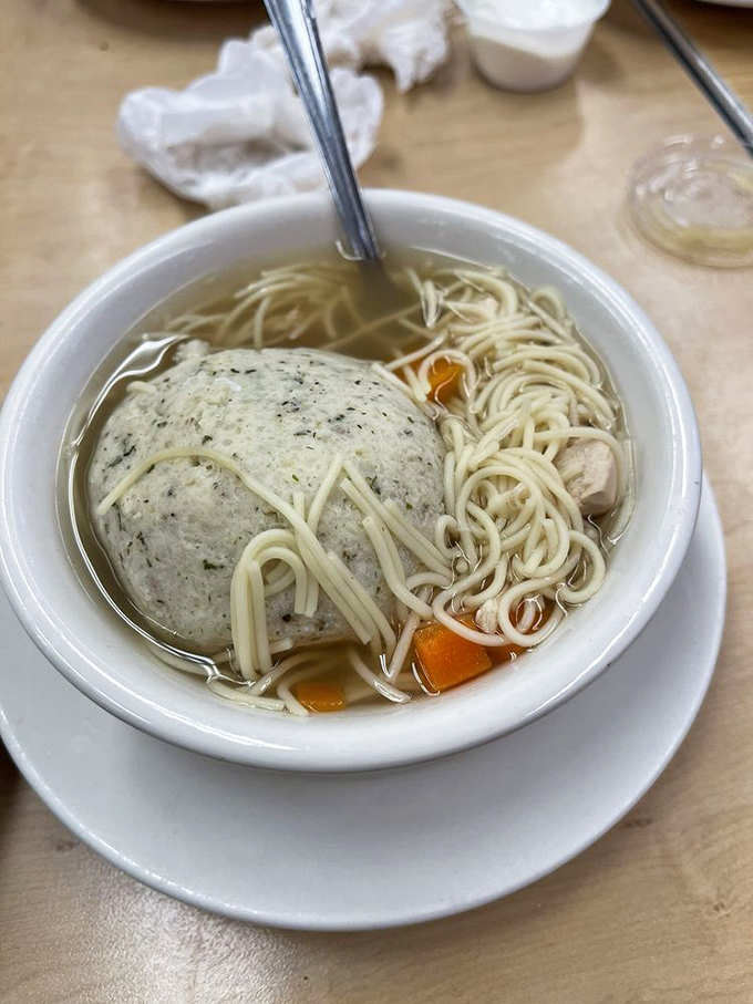 The matzo ball soup that launched a thousand "not as good as Katz's" comparisons at family dinners across America.
