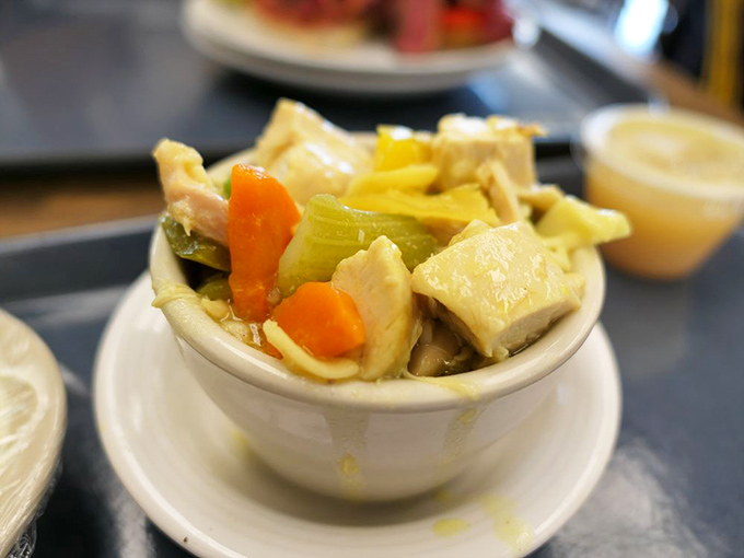 This homestyle chicken soup doesn't just warm the body; it negotiates peace treaties with winter colds and workplace stress like a culinary diplomat.