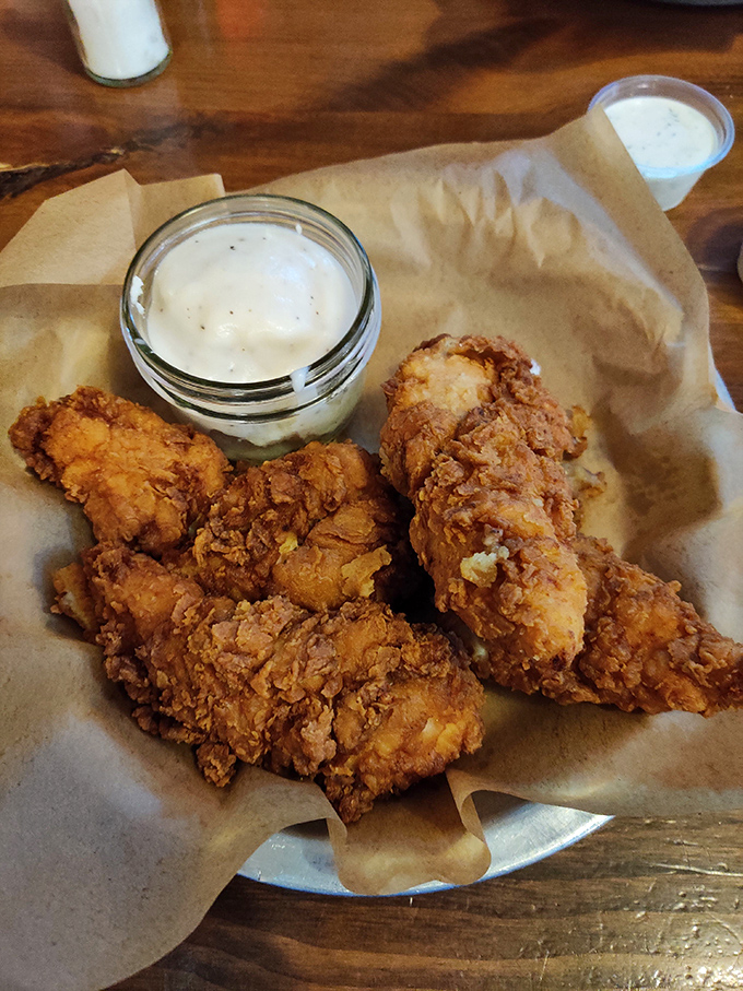 Golden-brown chicken strips that make you question why you ever bothered with fancy restaurants. Simple perfection served with a side of nostalgia.