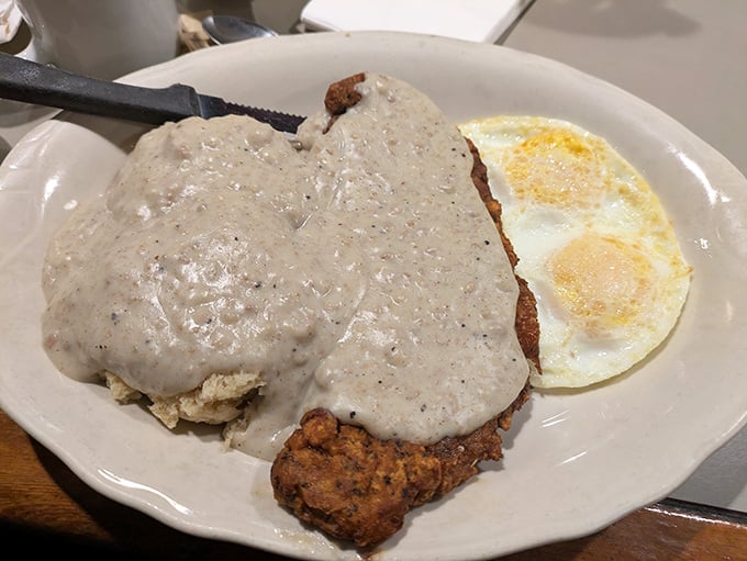 When country gravy blankets your chicken fried steak like a winter snowfall, you know you're in for comfort food that hugs you from the inside.