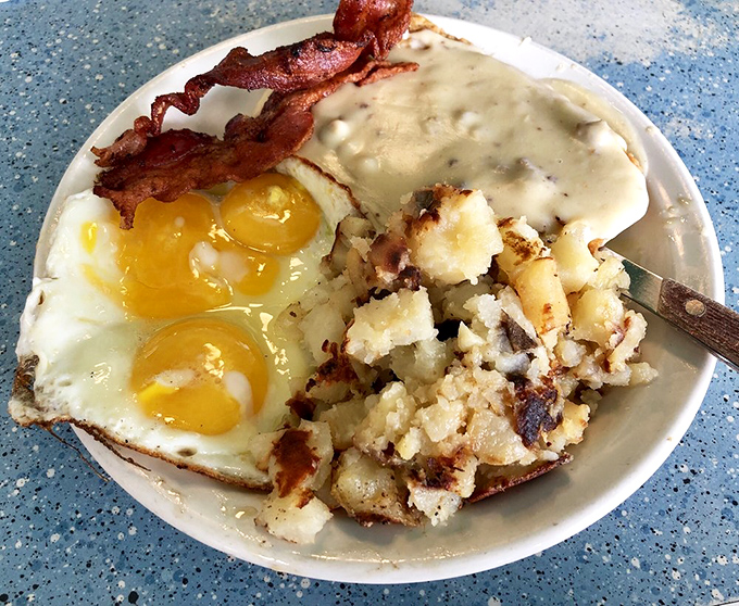 Sunny-side up eggs and crispy hash browns flanking bacon strips that achieved the perfect balance between crisp and chewy. Breakfast nirvana exists!