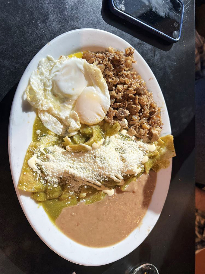 Two magnificent burritos with sides of salsa and beans prove that some of life's best pleasures come wrapped in flour tortillas.