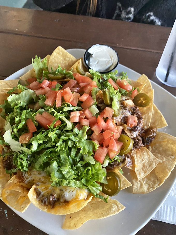 These nachos aren't trying to be fancy&mdash;they're just trying to be delicious. Mission accomplished with a mountain of cheese, fresh veggies, and jalape&ntilde;os for kick.