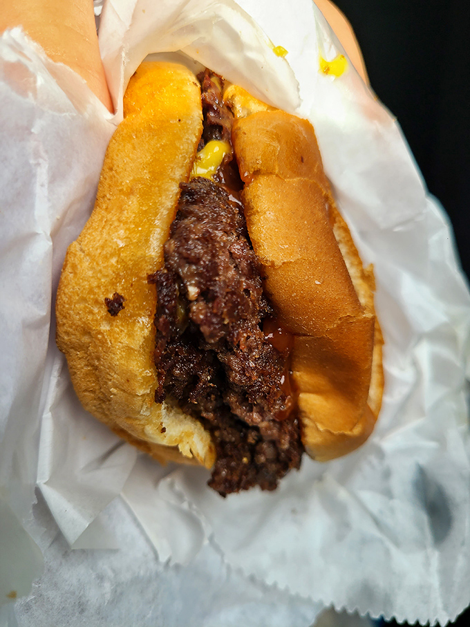 Even wrapped to go, that chili dog promises a flavor explosion that will have you planning your next visit before you've finished the first bite.