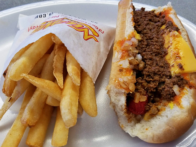 This isn't just lunch&mdash;it's edible nostalgia wrapped in paper. The cheese melting into that chili creates a flavor symphony worth driving for.