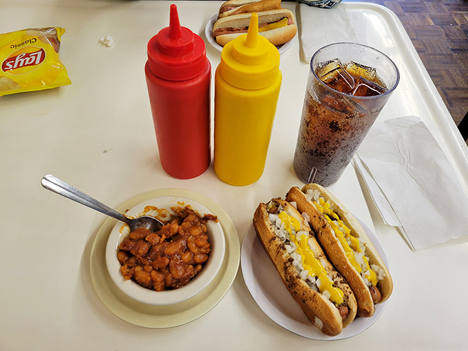 Condiment bottles standing at attention like loyal soldiers, ready to enhance&mdash;but never overshadow&mdash;the star of the show.