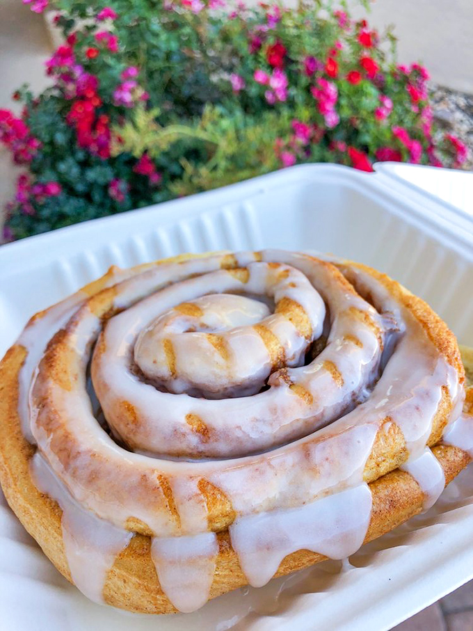 Behold the spiral of joy that's worth every mile of the journey. This cinnamon masterpiece makes ordinary rolls look like distant, less-evolved cousins.