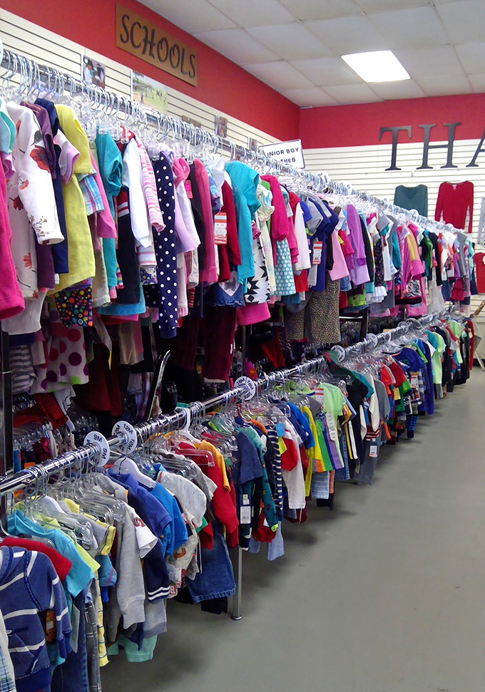 The children's clothing section explodes with color and possibility. Growing kids and shrinking wallets find happy compromise in these well-organized racks.