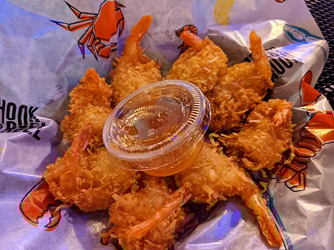 Coconut shrimp arranged like a sunburst of crispy, tropical goodness. The dipping sauce is just a bonus for what's already vacation-on-a-plate.