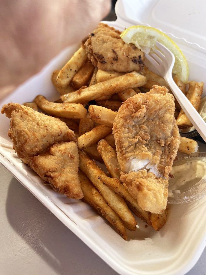 Golden-battered fish that shatters with each bite, paired with fries that could make a potato proud&mdash;the classic combo that never disappoints.