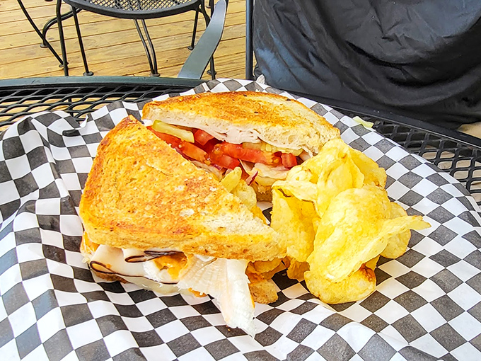 Behold the Cordon Bleu sandwich&mdash;where bacon, ham, and what appears to be a crispy chicken cutlet have united in a bread-bound flavor conference.