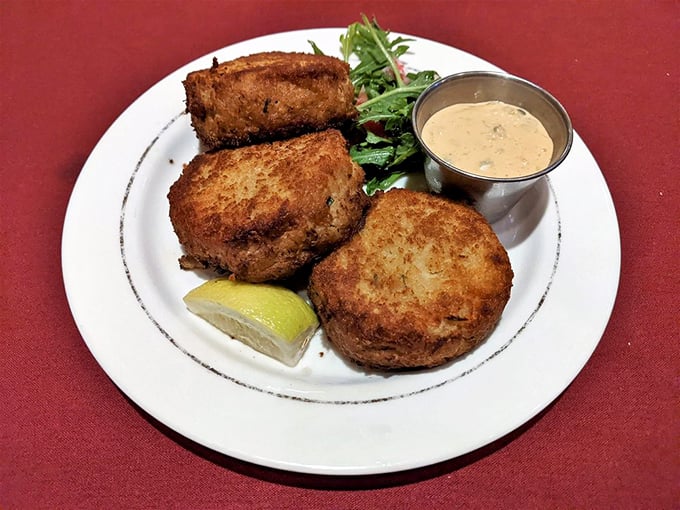 These crab cakes don't play games—they're the Sinatra of seafood starters: classic, substantial, and guaranteed to make your taste buds swoon.