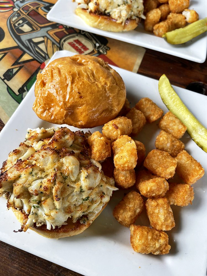The only improvement on a perfect crab cake? Putting it on a toasted bun with tater tots that crunch like your diet plan being happily abandoned.