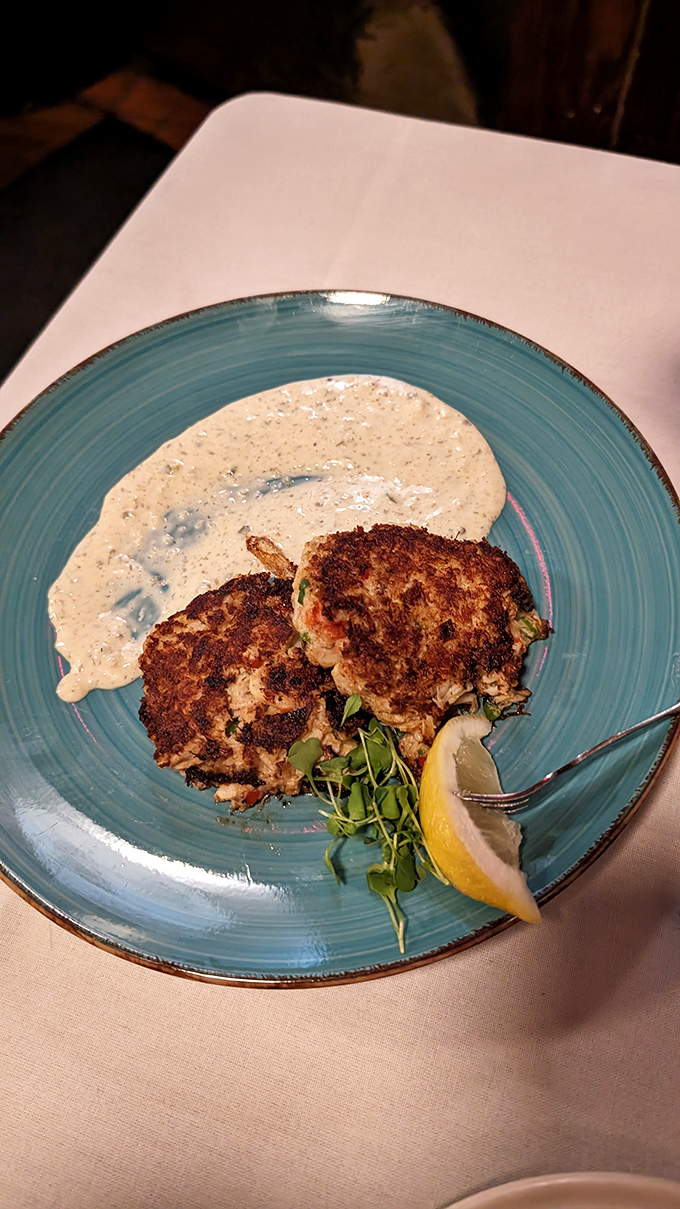 These crab cakes aren't just cooked—they're bronzed to perfection, like Olympic medalists in the seafood games.