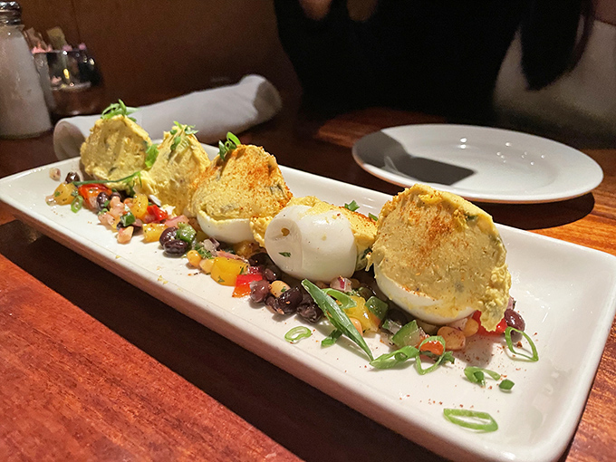 Sprinkled with paprika and green onions, these deviled eggs aren't just appetizers&mdash;they're the reason people make reservations weeks in advance.