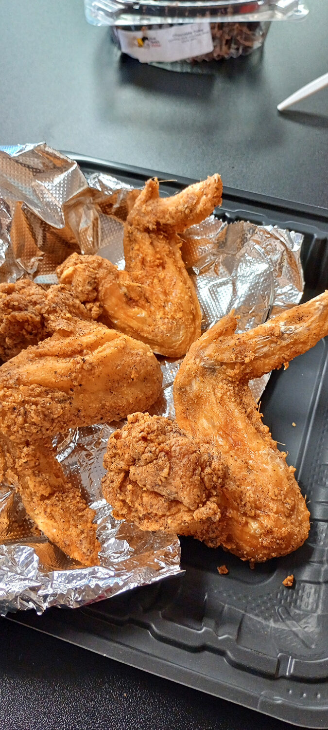 Crispy wings that could make angels weep. That golden-brown coating isn't just a color&mdash;it's a promise of the flavor explosion waiting inside.