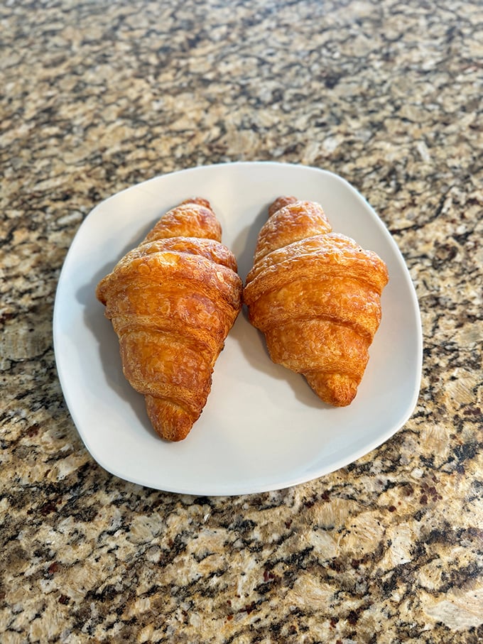 Croissants so perfectly golden and flaky, they could qualify for French citizenship. Each buttery layer is a passport to pastry paradise.