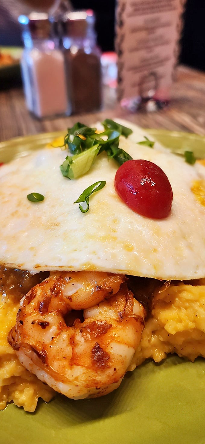 These shrimp aren't just swimming in grits&mdash;they're performing synchronized diving routines into golden pools of Cajun-spiced heaven.