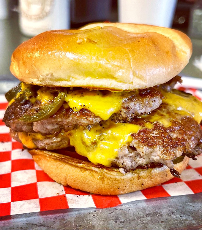 This burger isn't just stacked&mdash;it's engineered for maximum pleasure. The jalape&ntilde;os aren't asking permission to join the party.