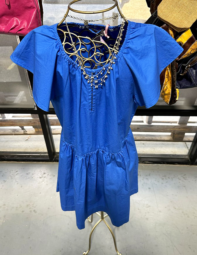 Something blue that isn't borrowed! This charming dress with delicate neckline detailing awaits its next special occasion or everyday adventure.