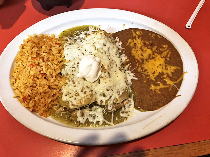 Enchiladas Suizas: where Mexican tradition meets creamy indulgence. That dollop of sour cream on top isn't just garnish&mdash;it's the cherry on this south-of-the-border sundae.