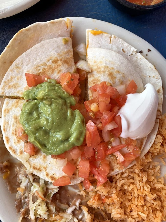 A quesadilla that's had a makeover! Topped with fresh pico, guacamole, and sour cream&mdash;it's the holy trinity of Mexican toppings.